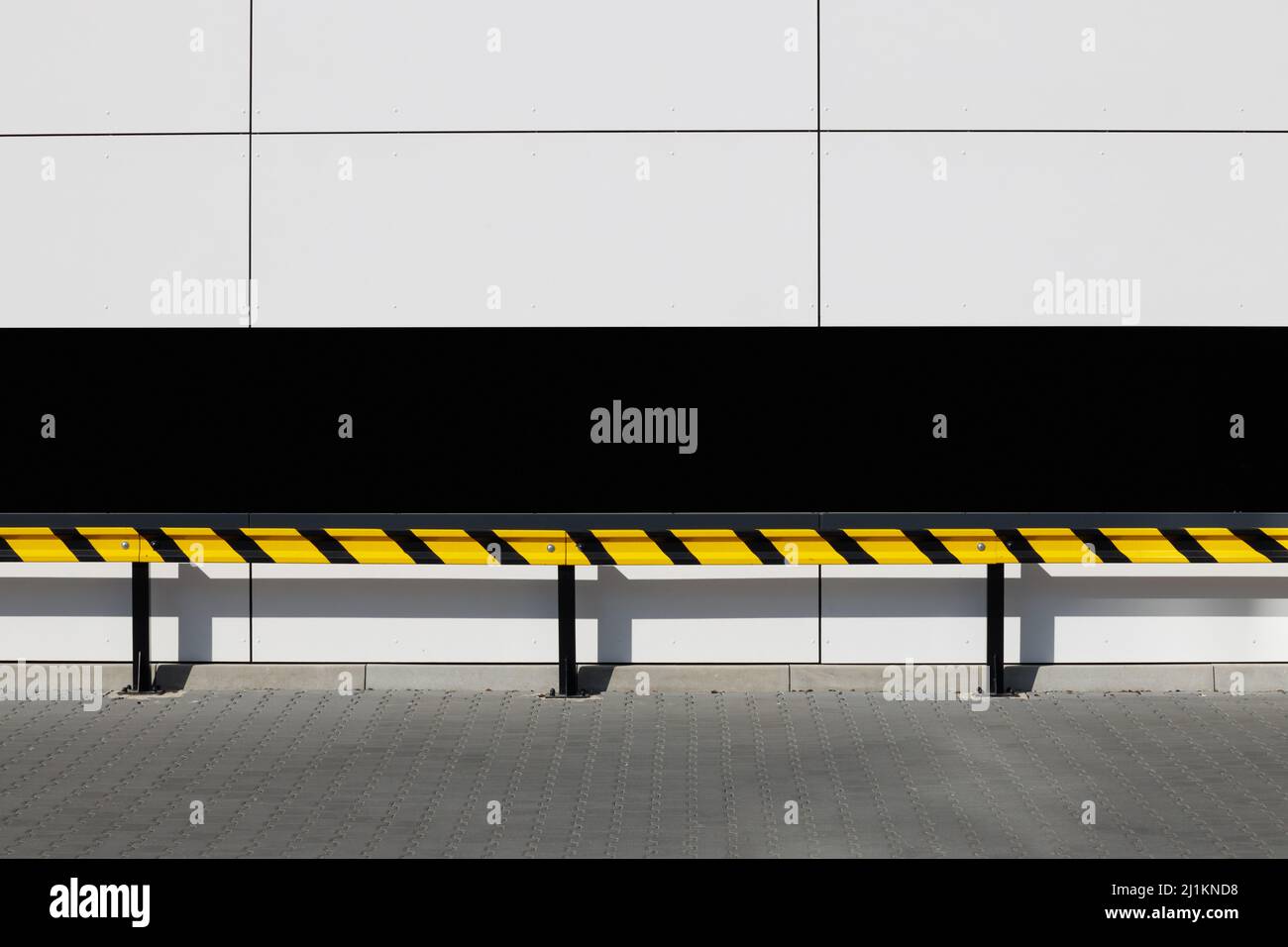 Safety barriers in a chewed up color in the parking lot. Protecting ...