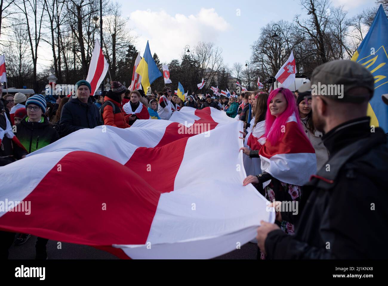 March 26, 2022, Warsaw, Poland: People hold a huge historical ...