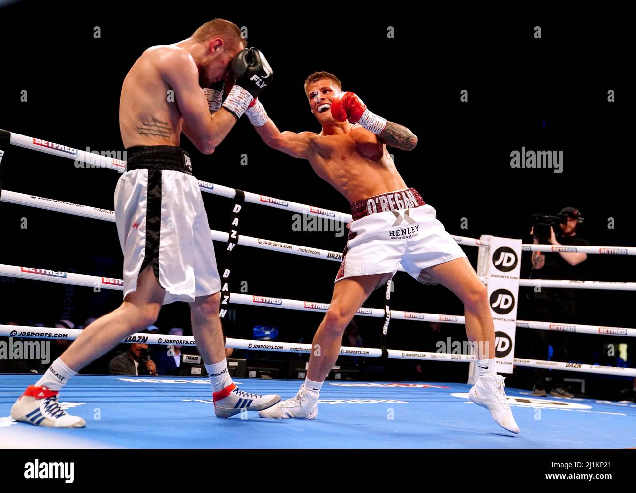 Cory O'Regan (right) in action against Jakub Laskowski during their ...