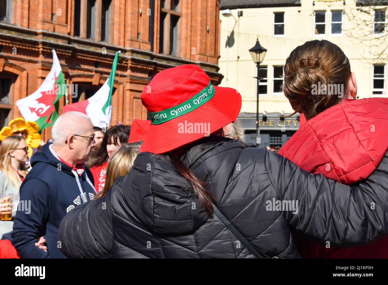 Cardiff, Wales - March 2022: Rugby fan wearing a red sun hat with Cymru ...