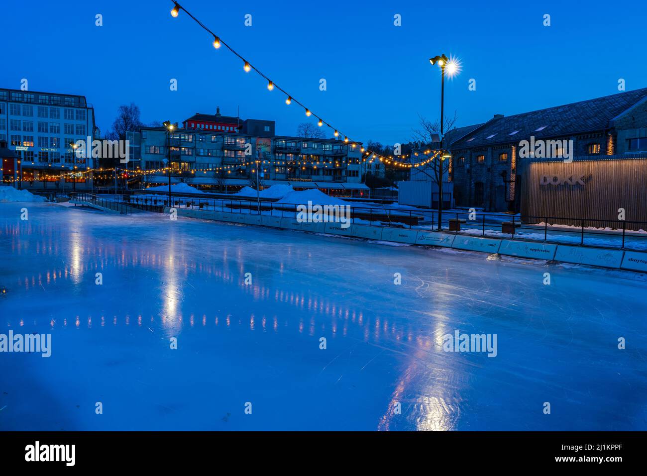 TRONDHEIM, NORWAY - MARCH 09, 2022: Evening view of ice skating rink in ...