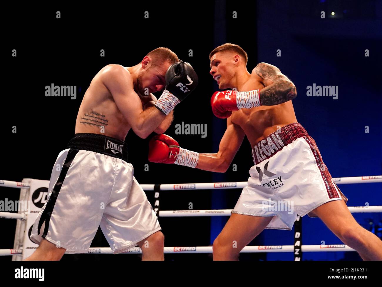 Cory O'Regan (right) in action against Jakub Laskowski during their ...