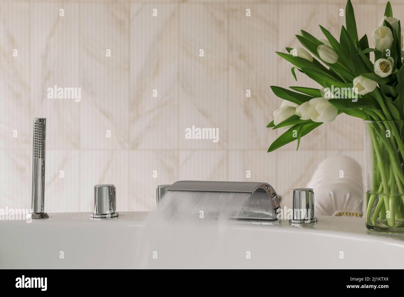 Water flows from a luxurious modern water faucet into a large modern ...