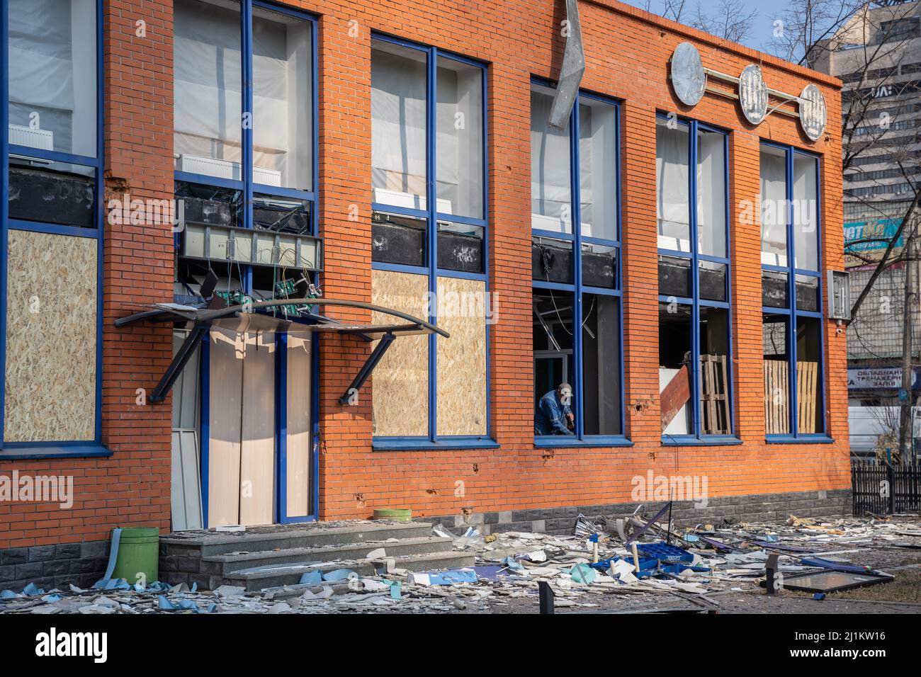 A destroyed shop as a result of a rocket attack Stock Photo - Alamy