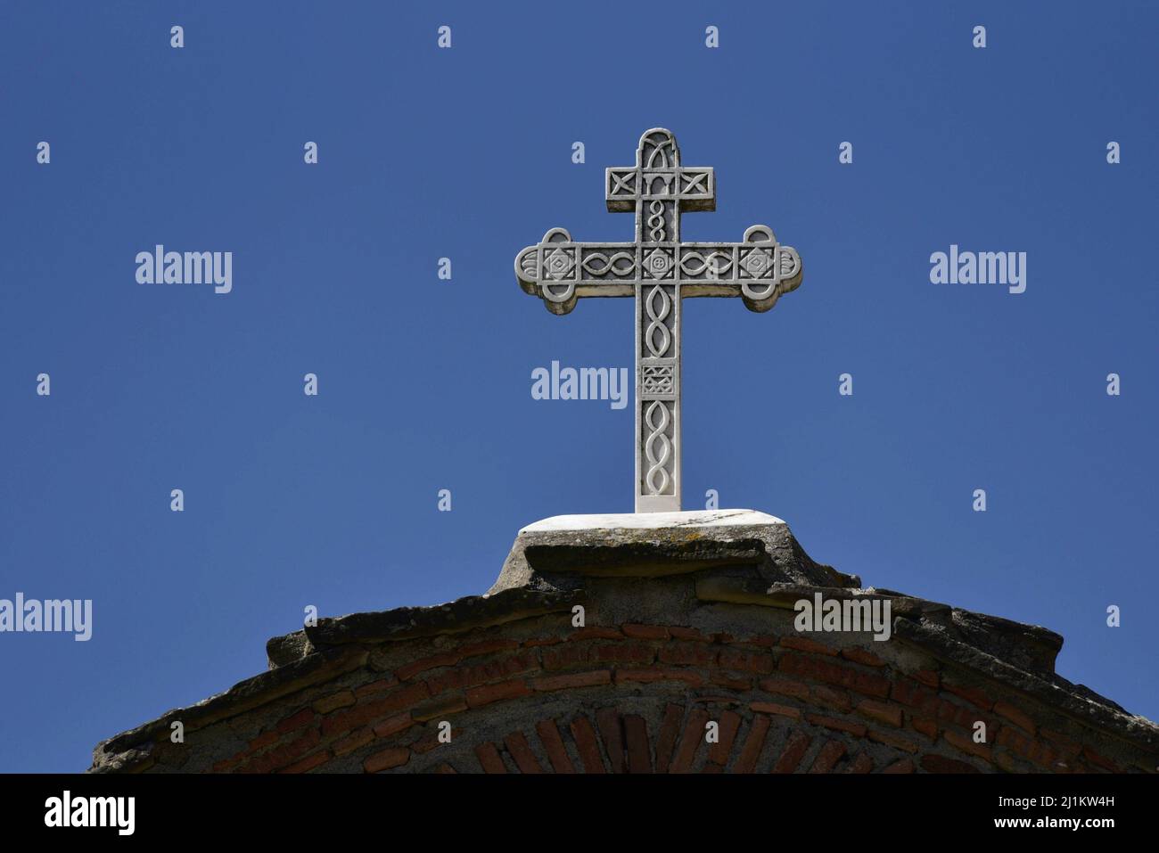 Marble cross on the rooftop of Aghia Fotini a peculiar Christian church ...
