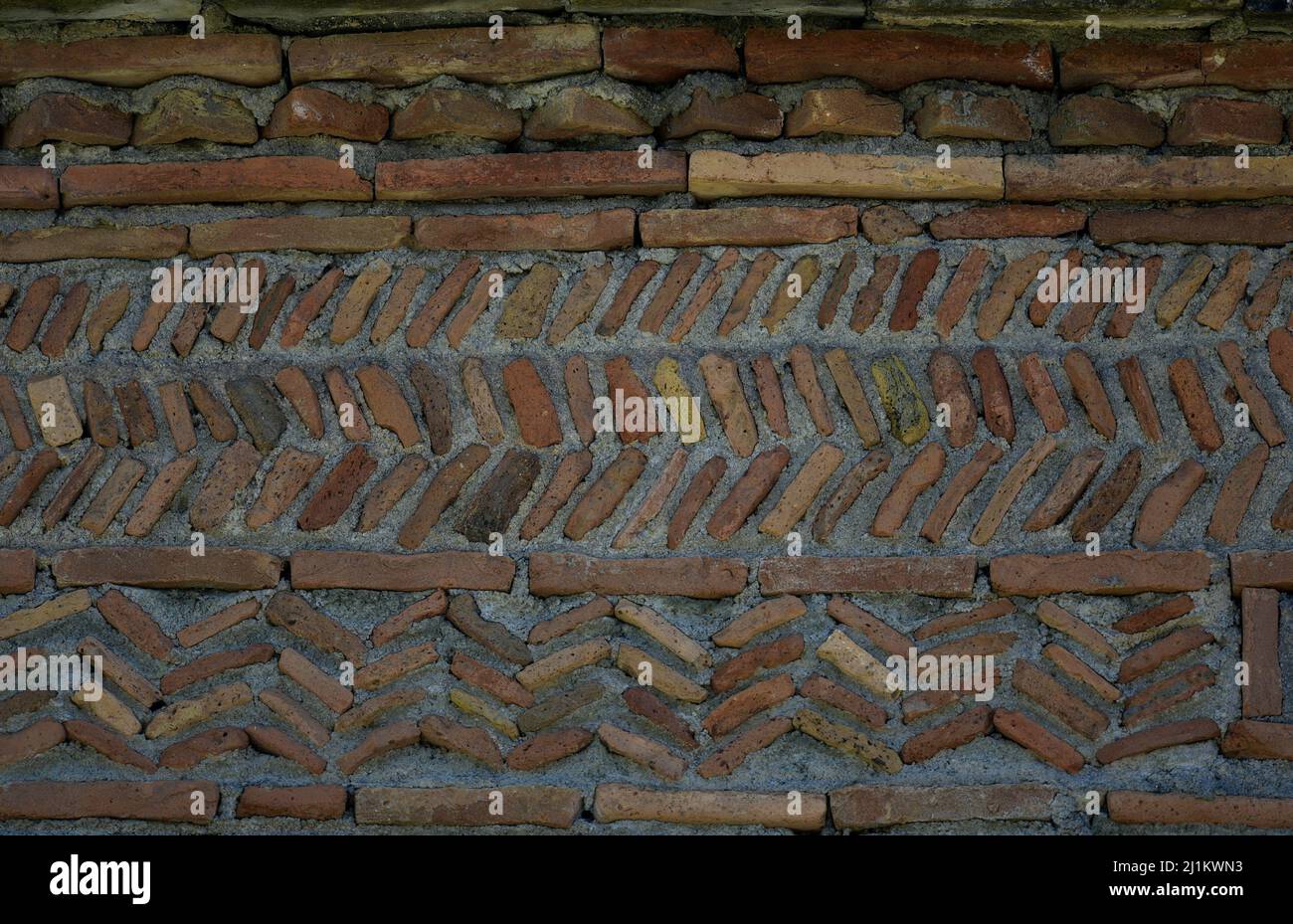 Stone and brick wall of Aghia Fotini a peculiar Christian church with ...