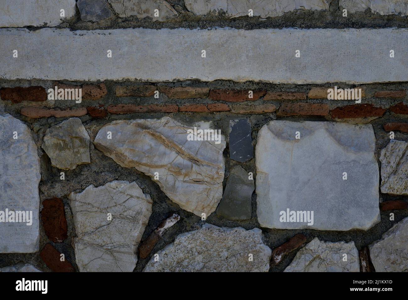 Stone and marble wall of Aghia Fotini a peculiar Christian church with ...