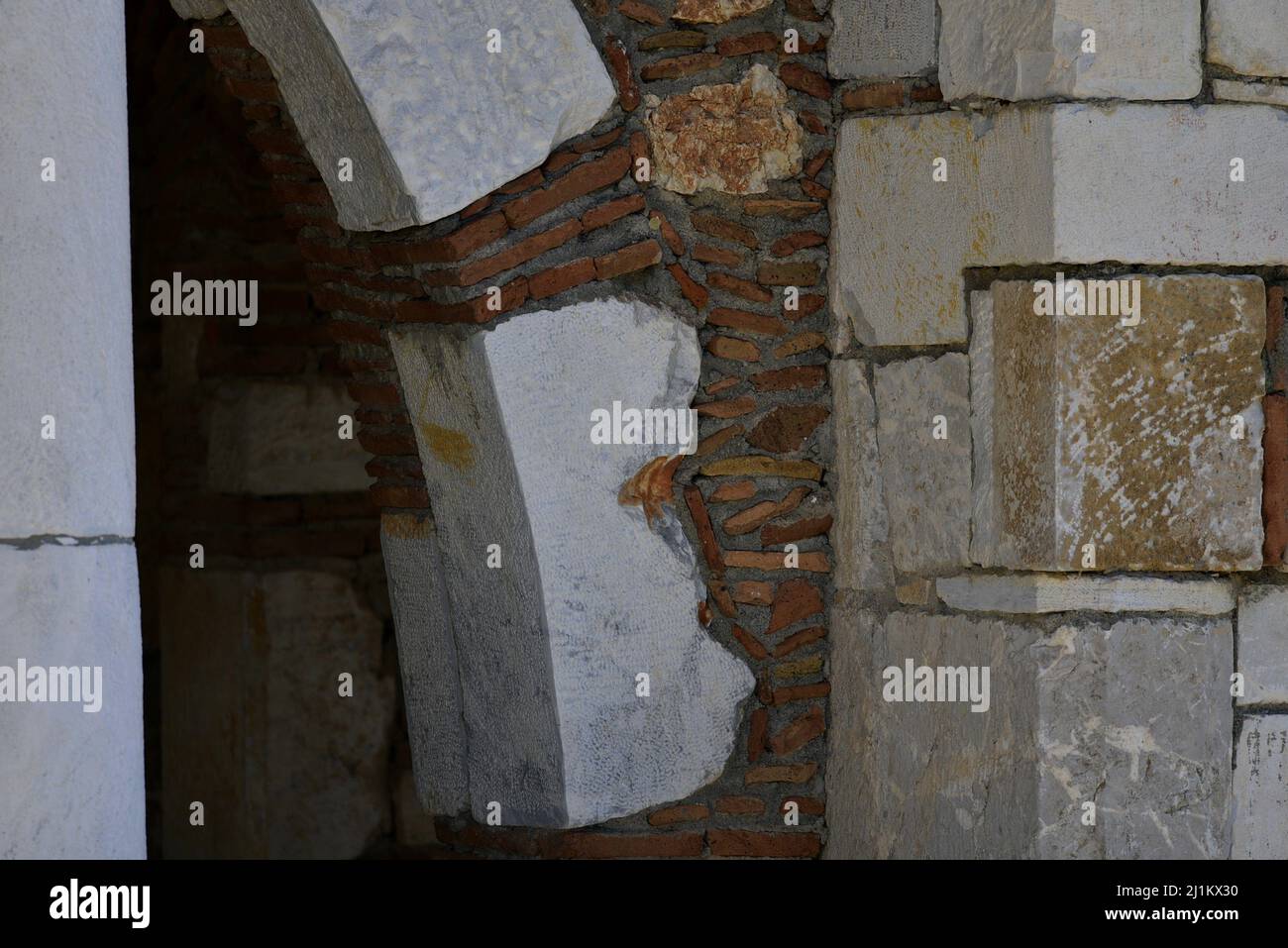 Stone and marble wall of Aghia Fotini a peculiar Christian church with ...
