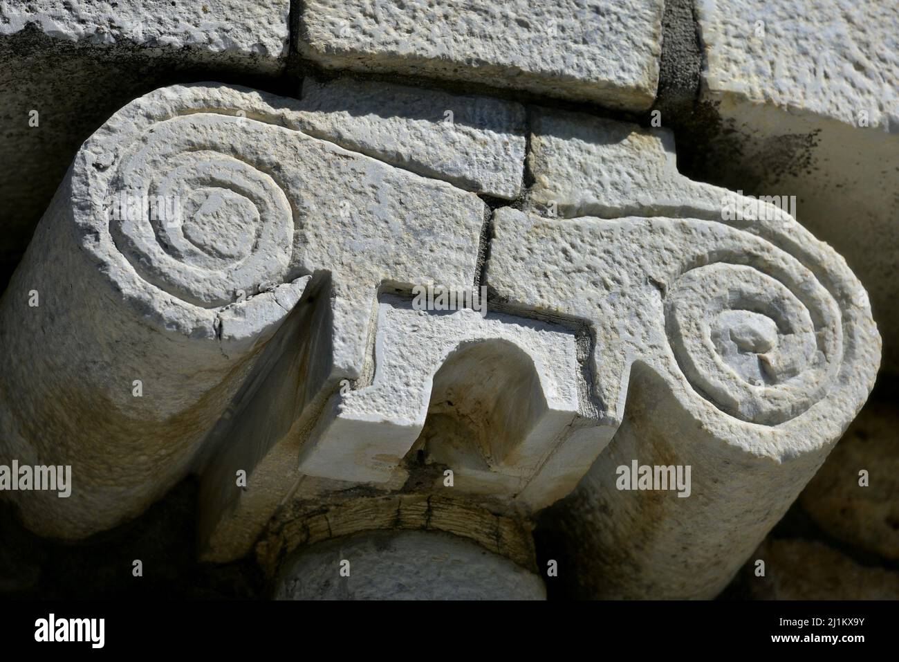 Ionic order limestone column detail of the Temple of Poseidon at the ...