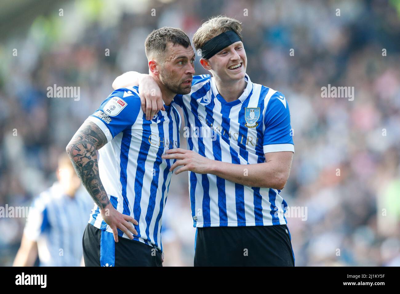George Byers #14 of Sheffield Wednesday and Jack Hunt #32 of Sheffield ...