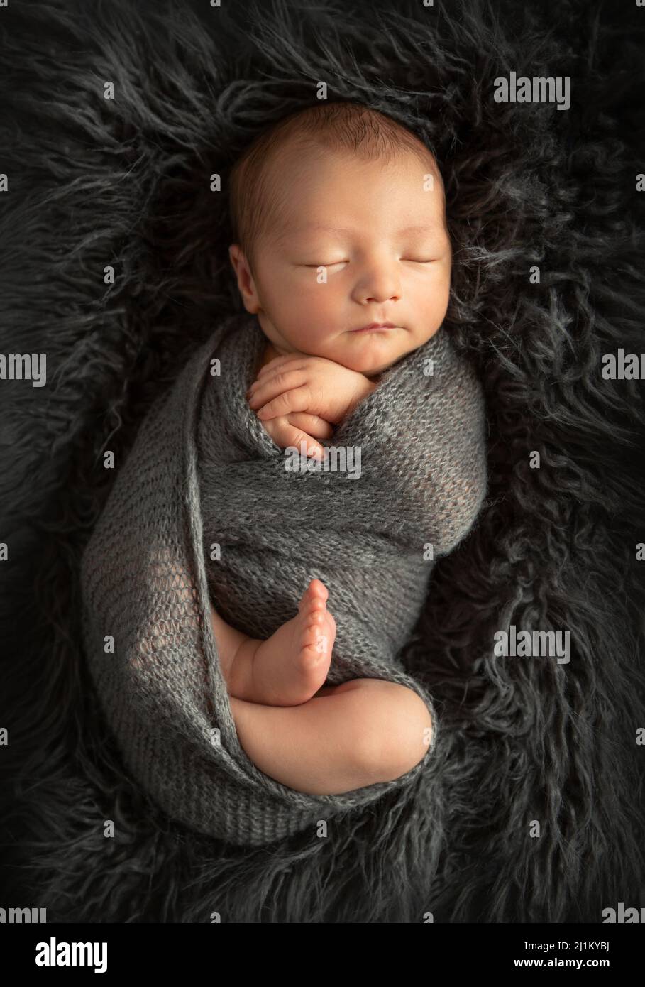 Newborn baby bundled up hi-res stock photography and images - Alamy