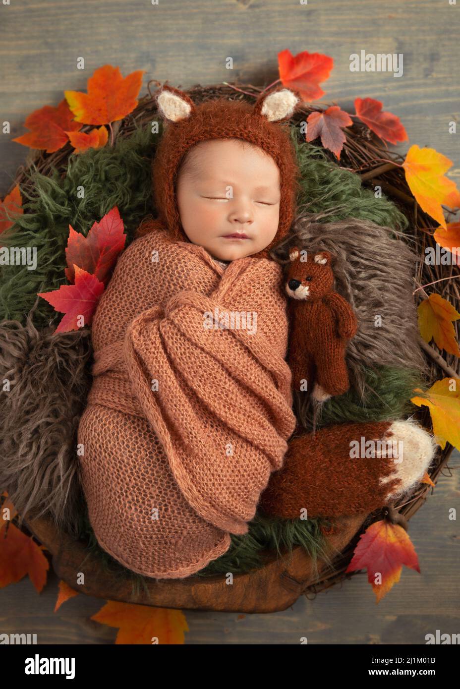 Infant swaddled hi-res stock photography and images - Alamy