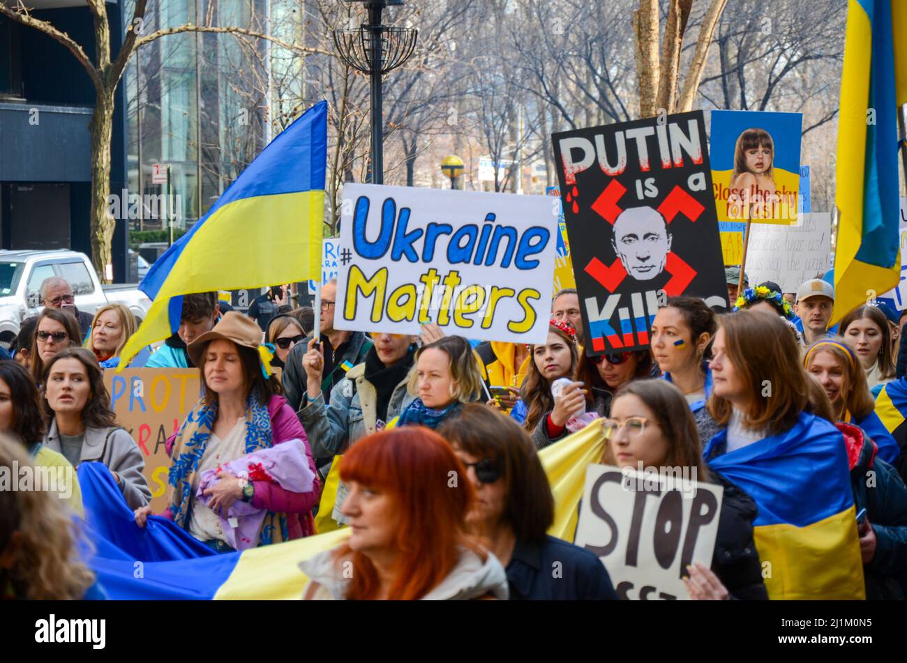 A participant is seen holding a sign that says Ukraine Matter at the ...