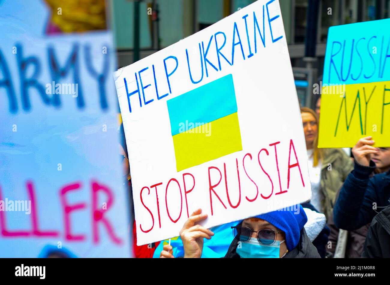 Demonstrators holding Help Ukraine sign at the United Nations plaza and ...