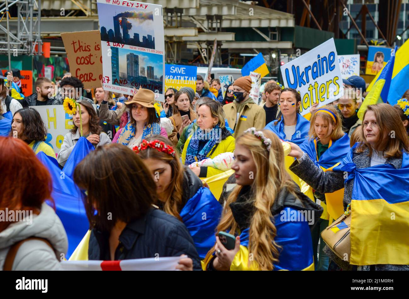 Demonstrators wearing blue and yellow (Ukrainian flag color) to show ...