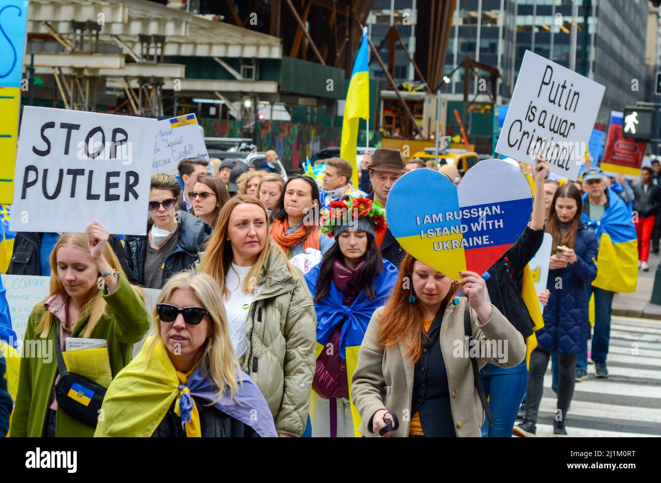Demonstrators wearing blue and yellow (Ukrainian flag color) to show ...