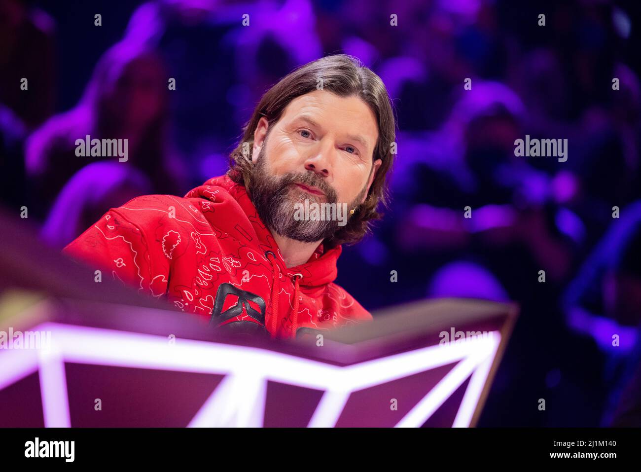 Cologne, Germany. 26th Mar, 2022. Rea Garvey from the guessing team ...