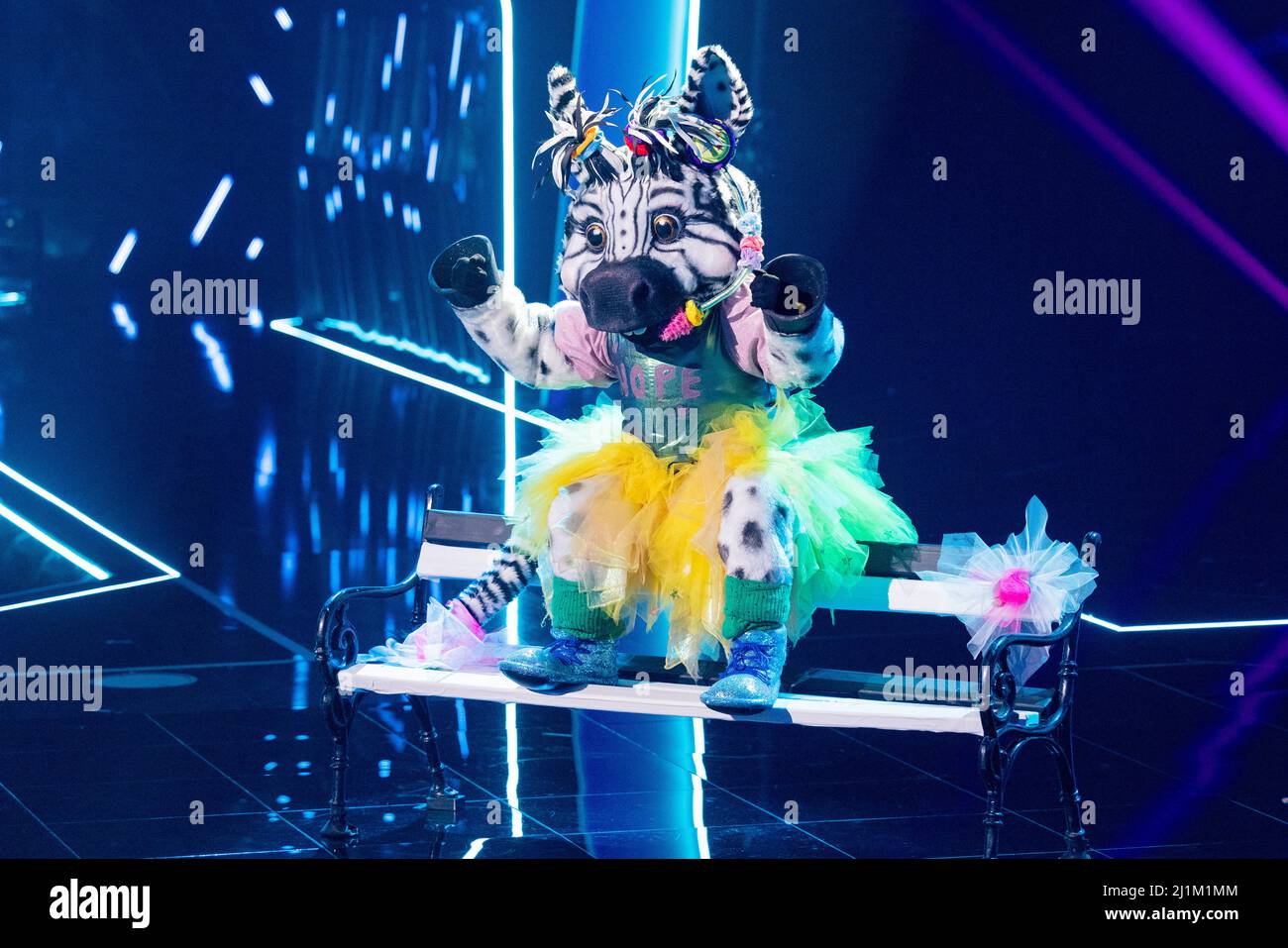 Cologne, Germany. 26th Mar, 2022. The character "The Zebra" is on stage ...