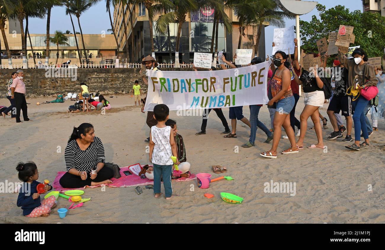 Mumbai, India. 26th Mar, 2022. Protesters hold a banner expressing ...