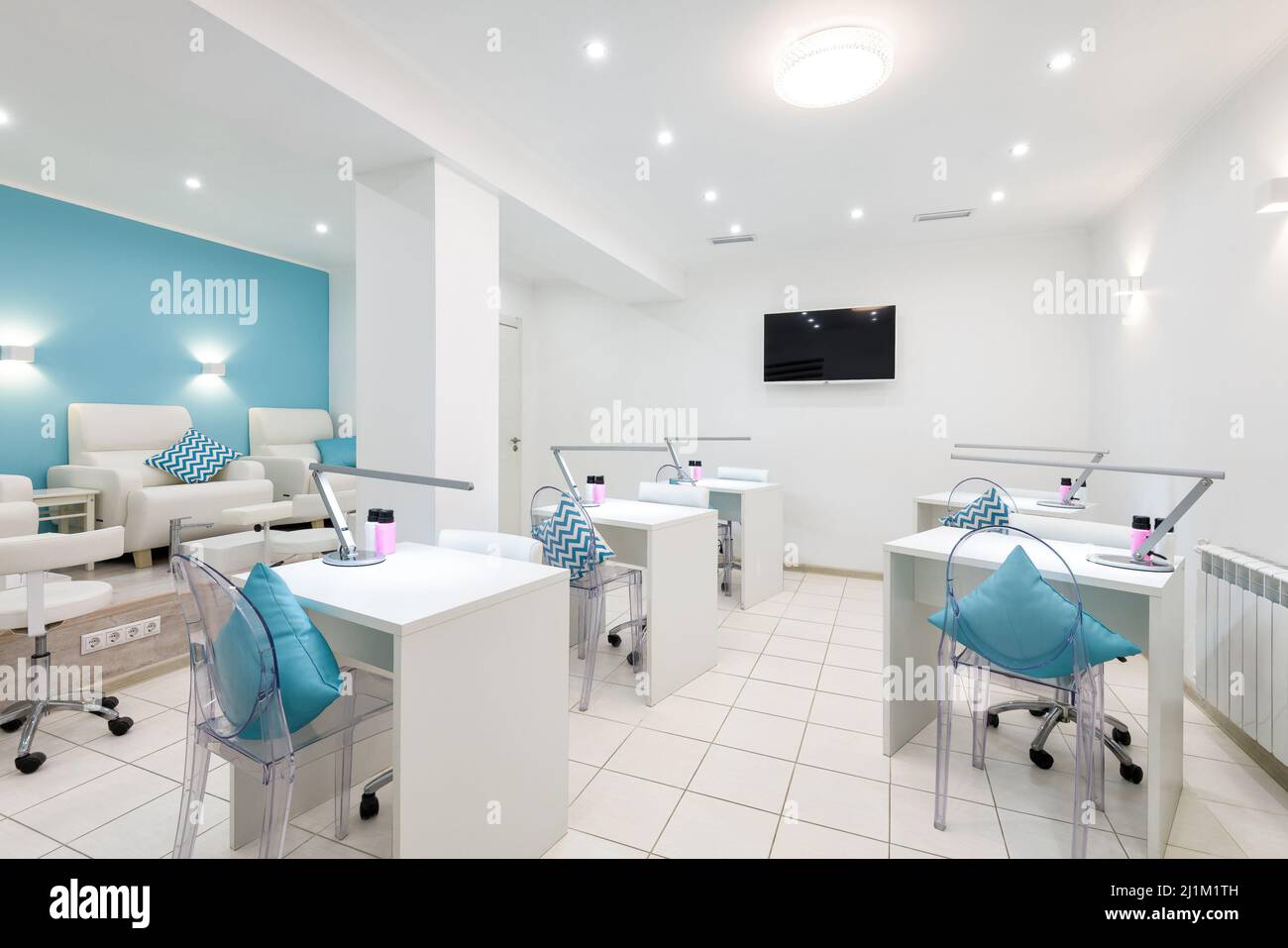 Nail salon bright interior, modern manicure shop or spa room. Inside ...