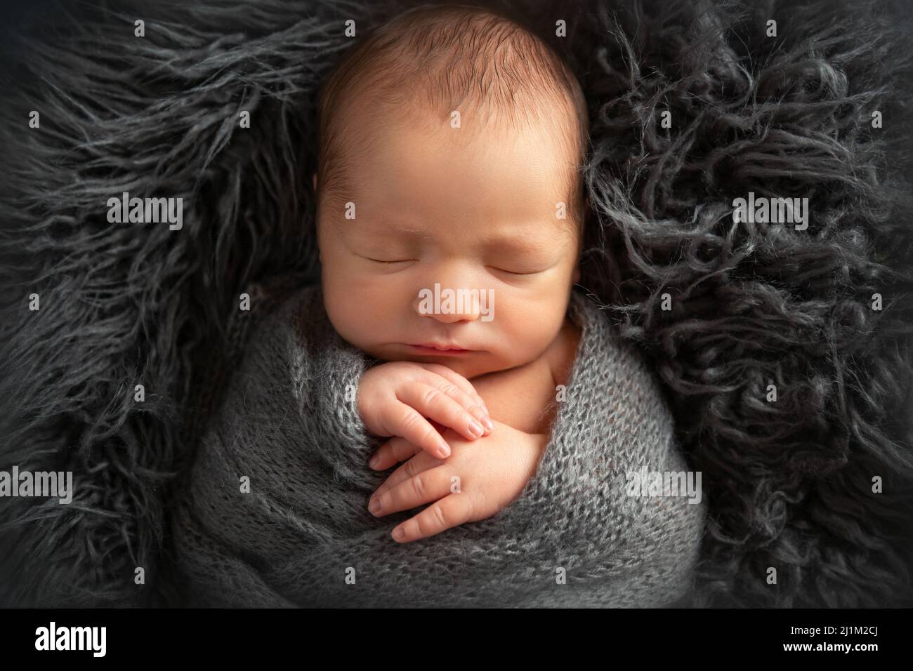 Newborn baby bundled up hi-res stock photography and images - Alamy