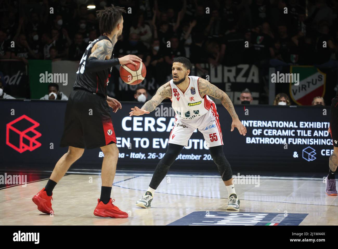 Daniel Hackett (Segafredo Virtus Bologna) (L) thwarted by Tyler Larson ...