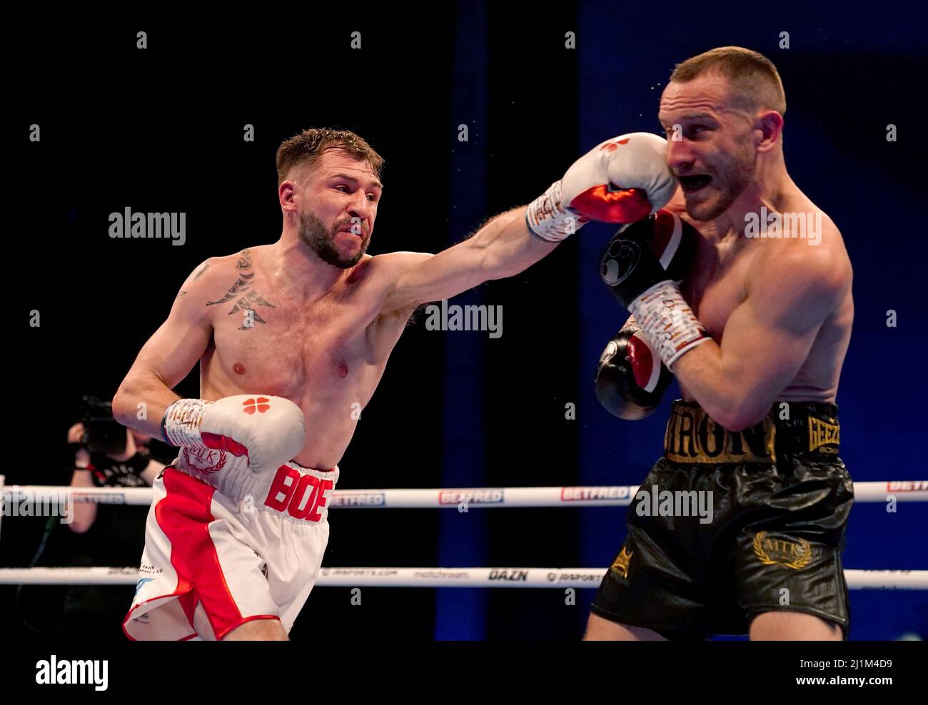 Maxi Hughes (left) in action against Ryan Walsh during their IBO World ...
