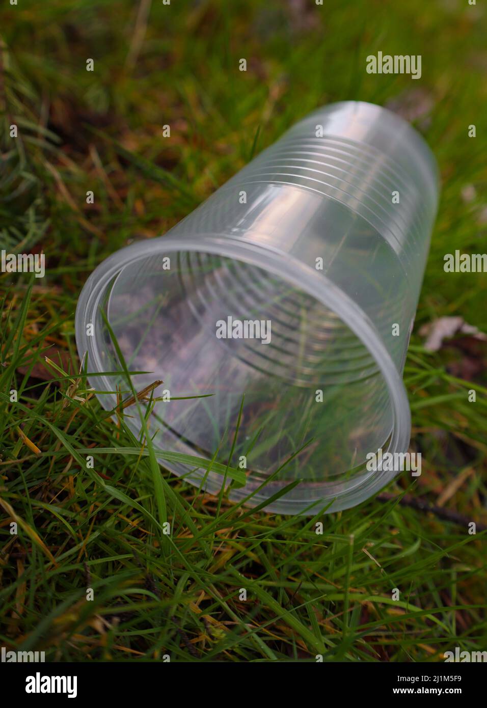 Plastic waste on grass hi-res stock photography and images - Alamy