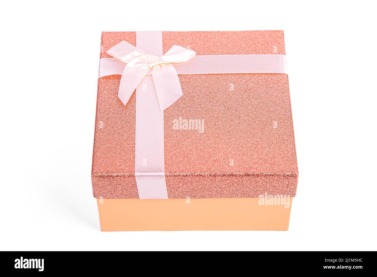 Peach-colored gift box on a white background Stock Photo - Alamy