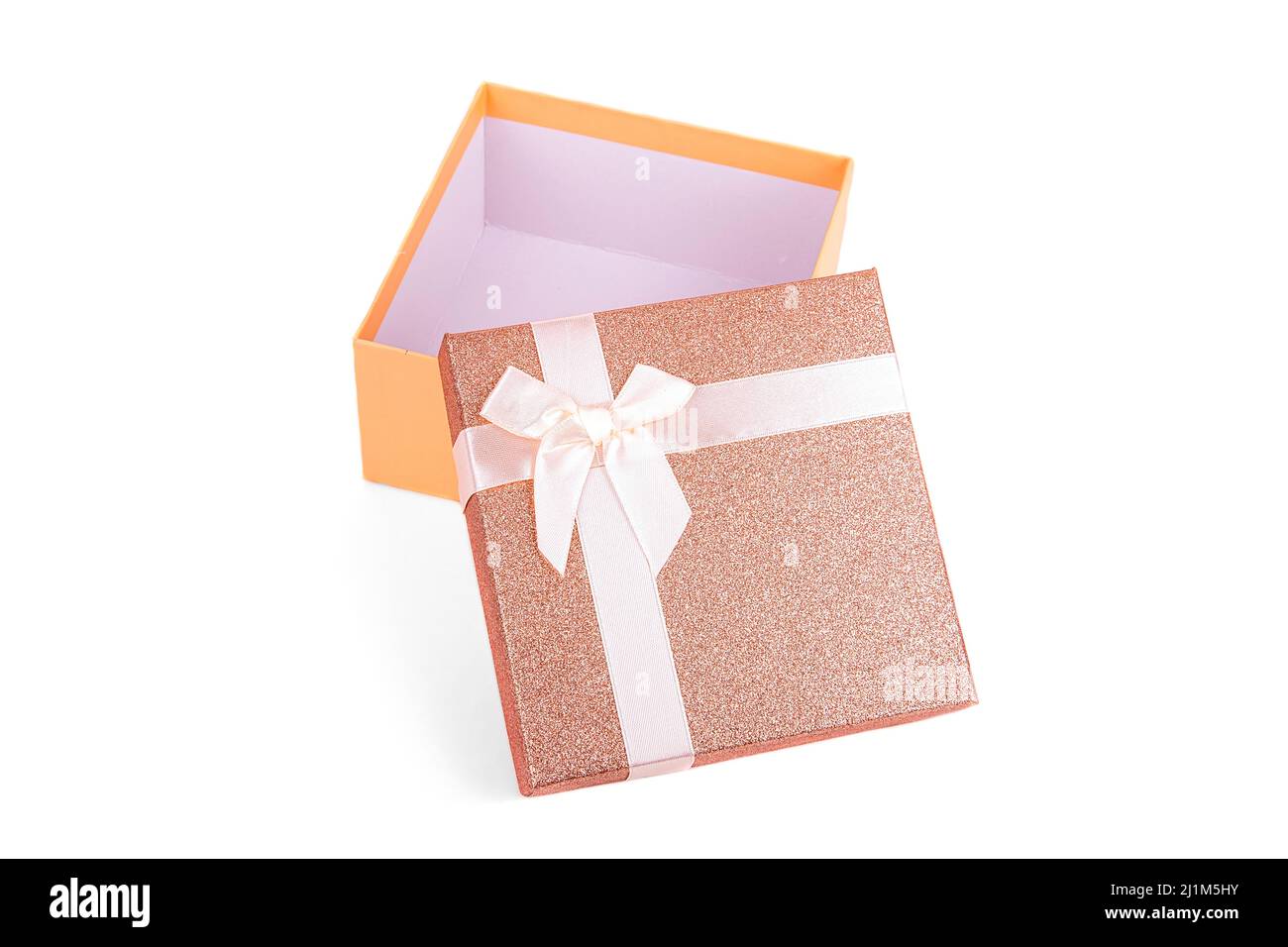 An open peach-colored gift box on a white background Stock Photo - Alamy