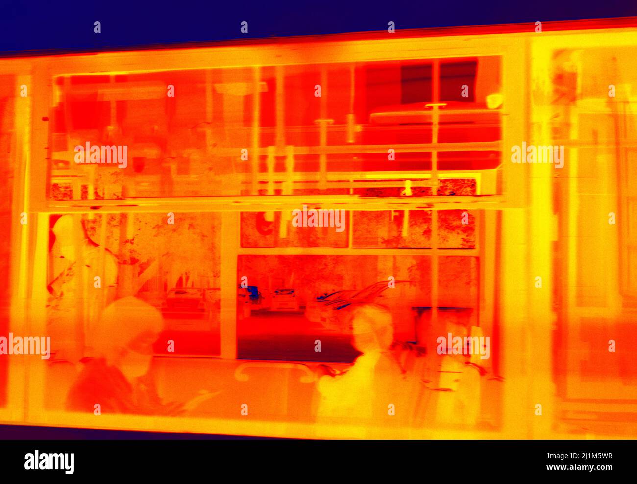Street, passers-by in masks during pandemic total quarantine. Red alert ...