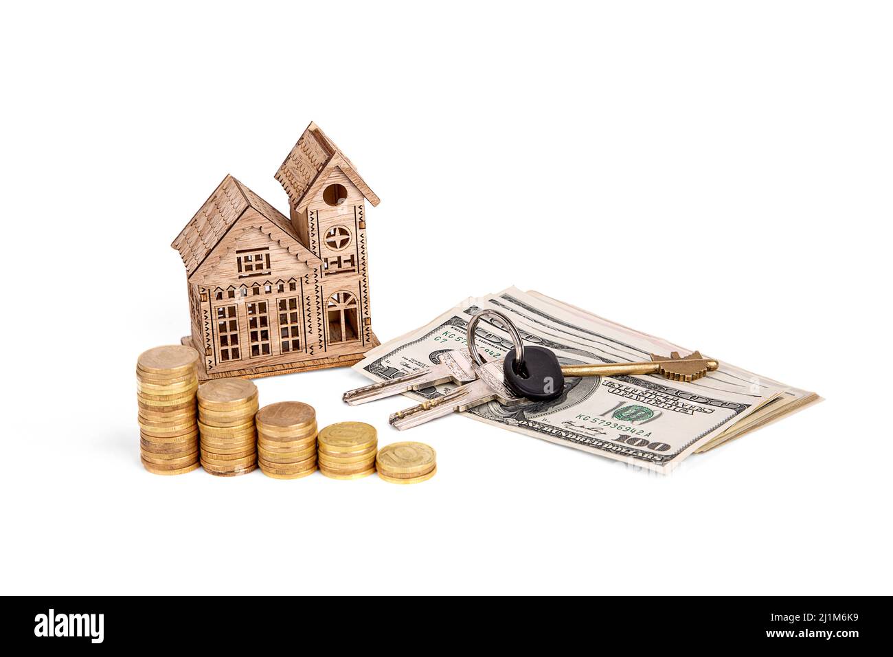 Wooden house, dollars, coins and keys on a white background Stock Photo ...
