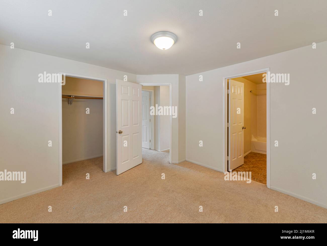 Modern residential empty bedroom interior Stock Photo - Alamy