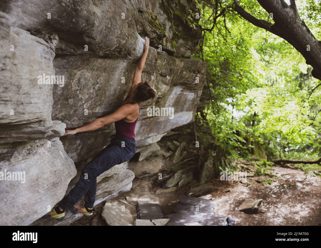 Woman bouldering at Kammeregg in Allgäu Stock Photo - Alamy