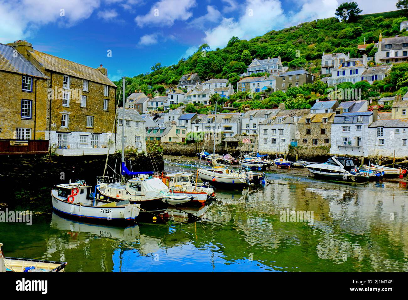 A scenic landscape view of the harbour at Polperro Stock Photo - Alamy