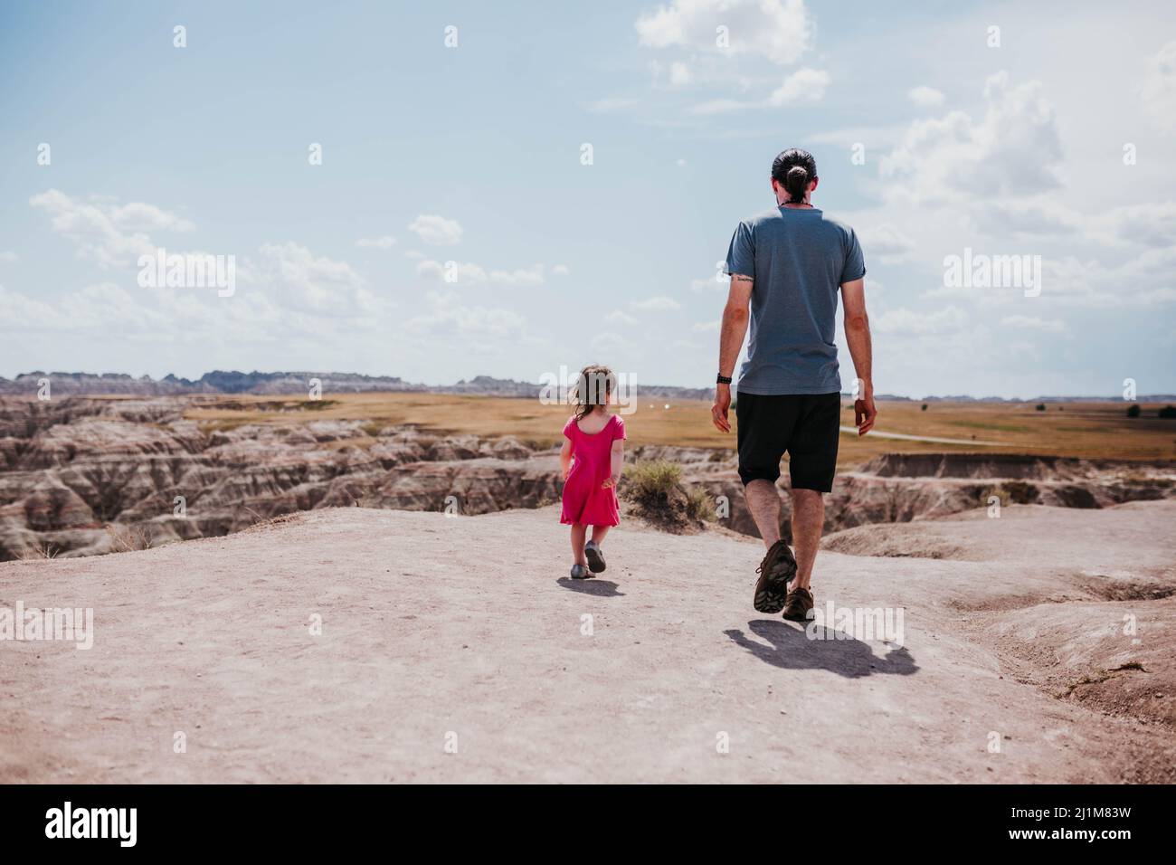 Father and daughter explore Badlands National Park, SD Stock Photo - Alamy