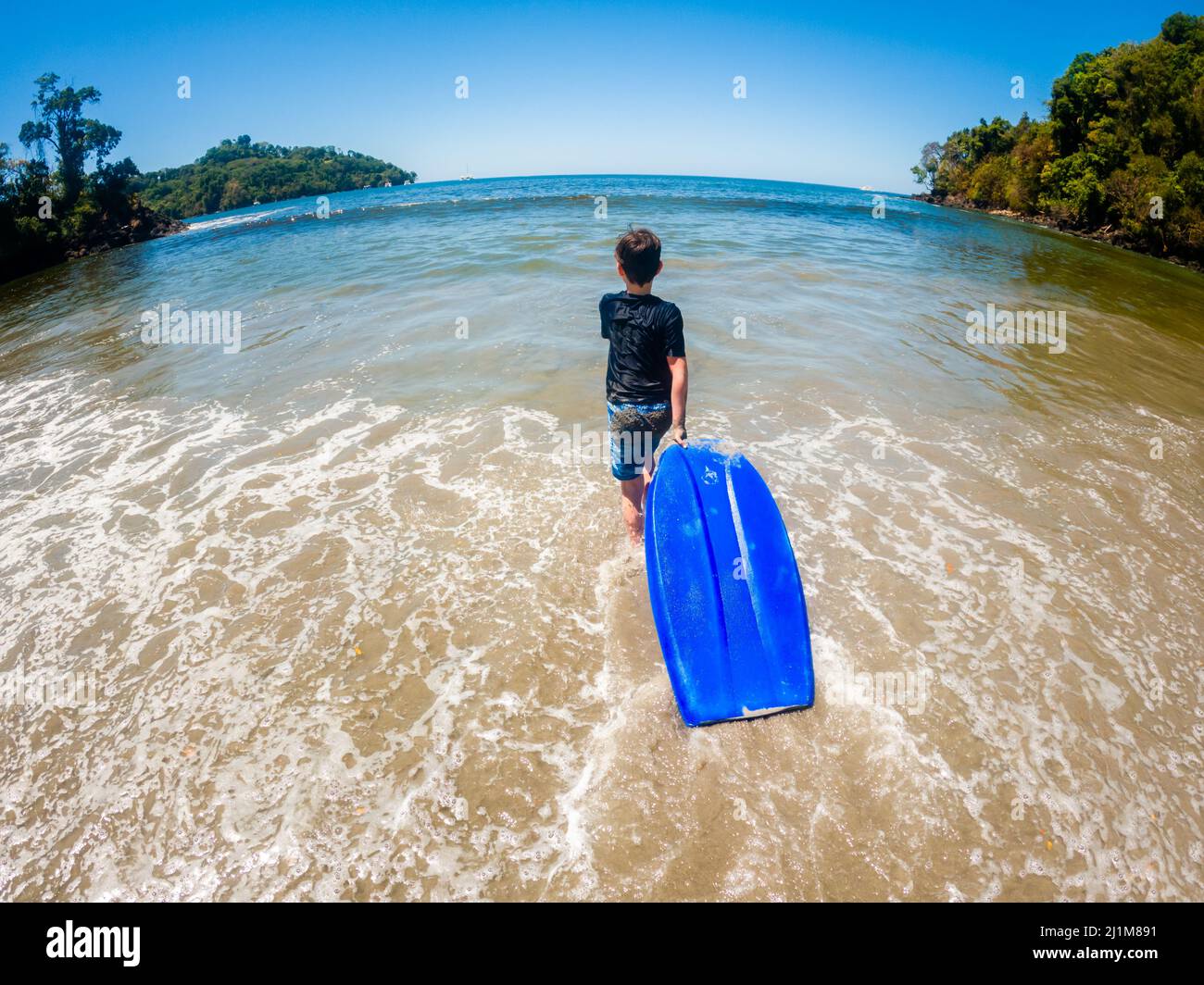 Boy boogie board hi-res stock photography and images - Alamy