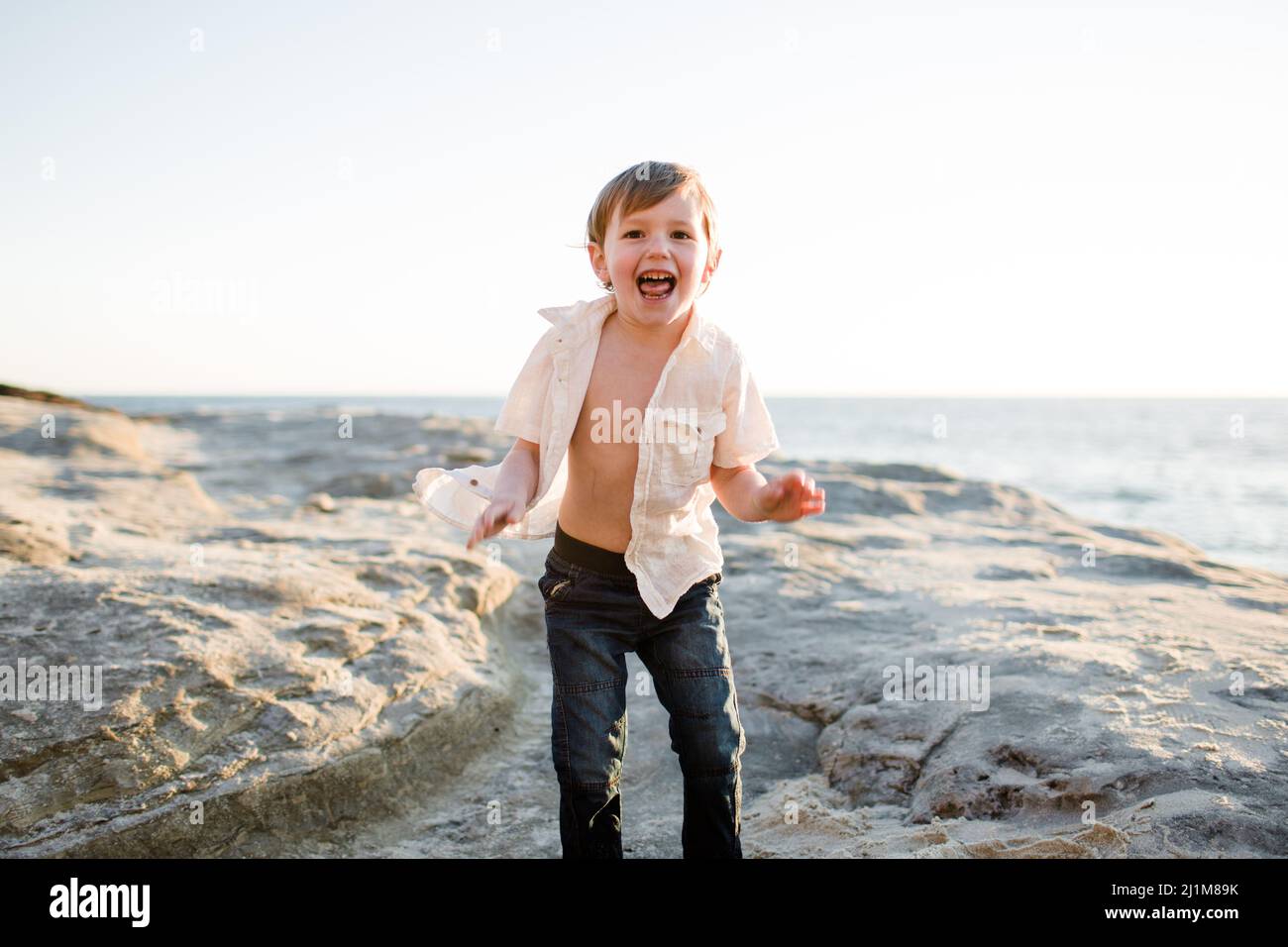 Unbuttoned blue shirt hi-res stock photography and images - Alamy