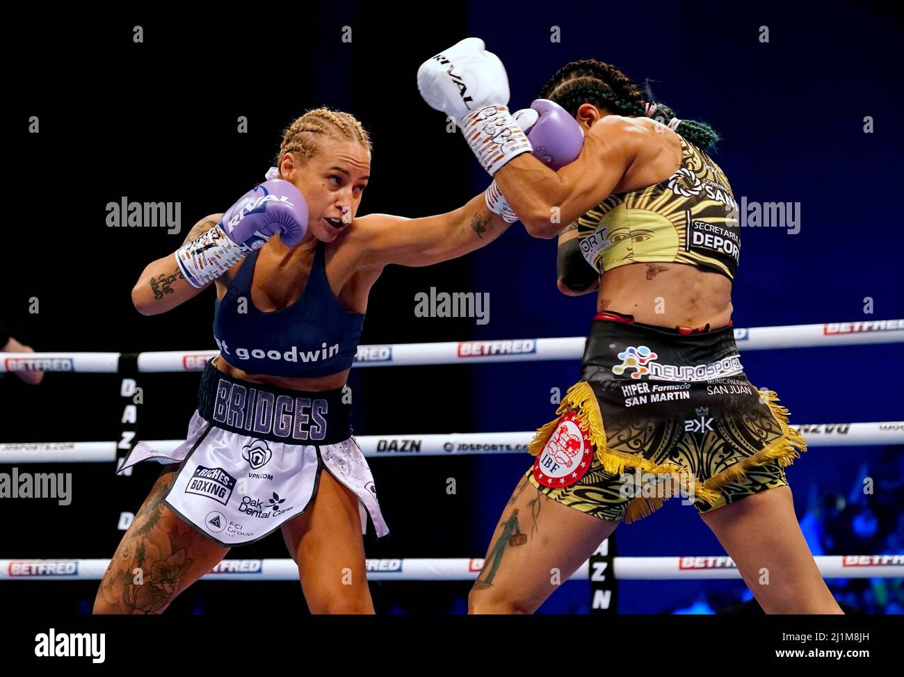Ebanie Bridges (left) in action against Maria Cecilia Roman during ...