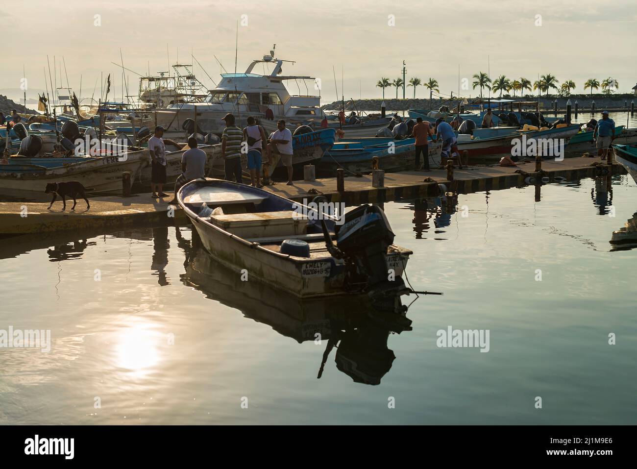 Local latin fishermen getting ready for sail at the dock Stock Photo ...