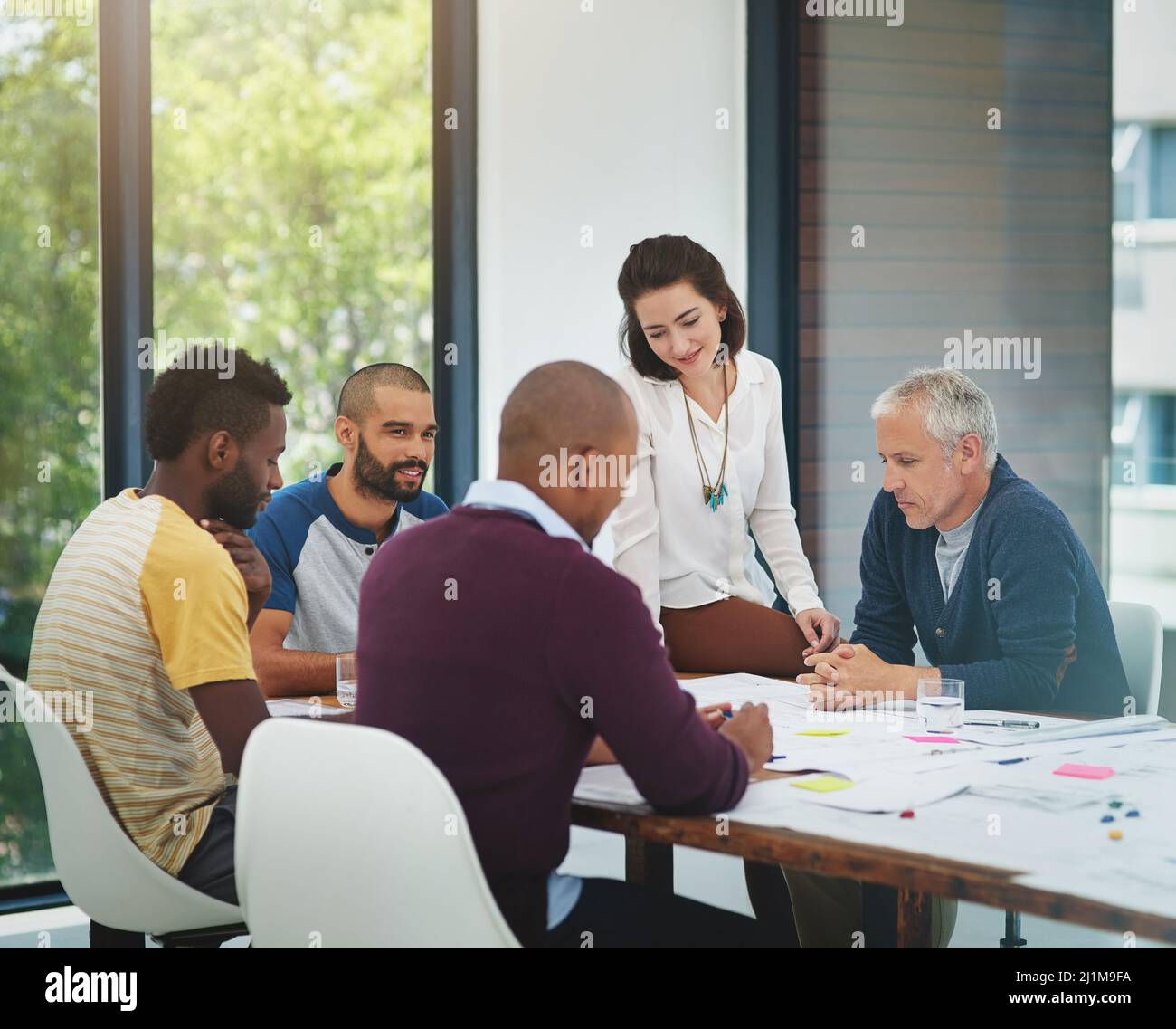 Creative discussions. Cropped shot of a group of architects looking ...