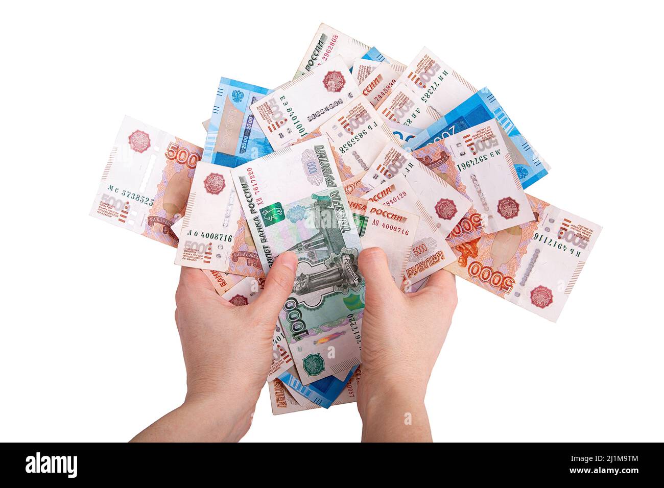Russian rubles in hands on a white background Stock Photo - Alamy