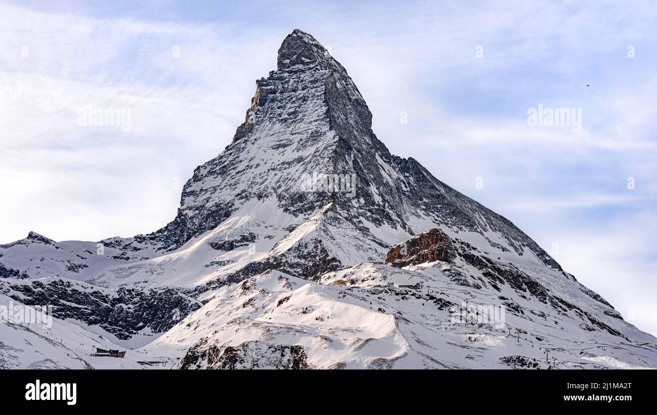 Snowy Matterhorn mountain in a cold-weather between Italy and ...