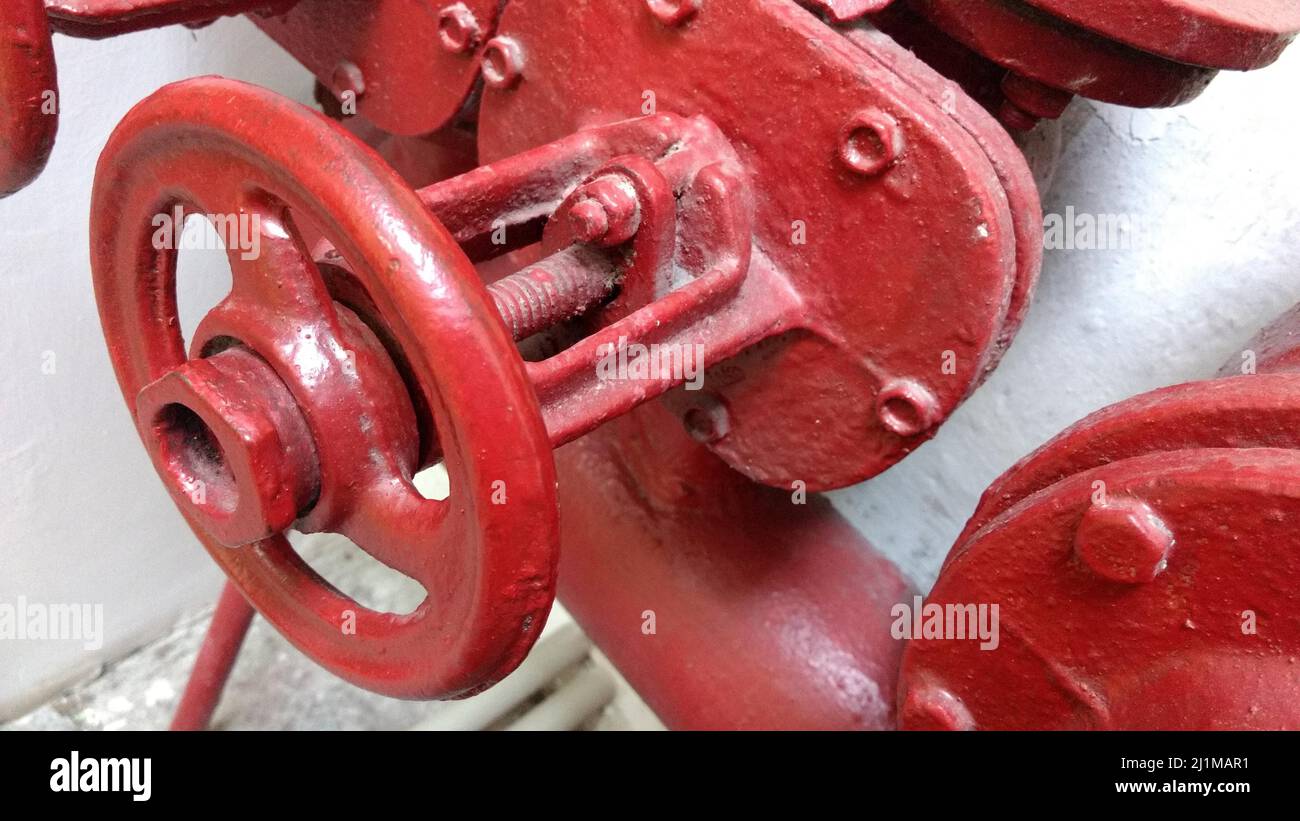 Fire hydrants. The red water pipes with spigot Stock Photo - Alamy