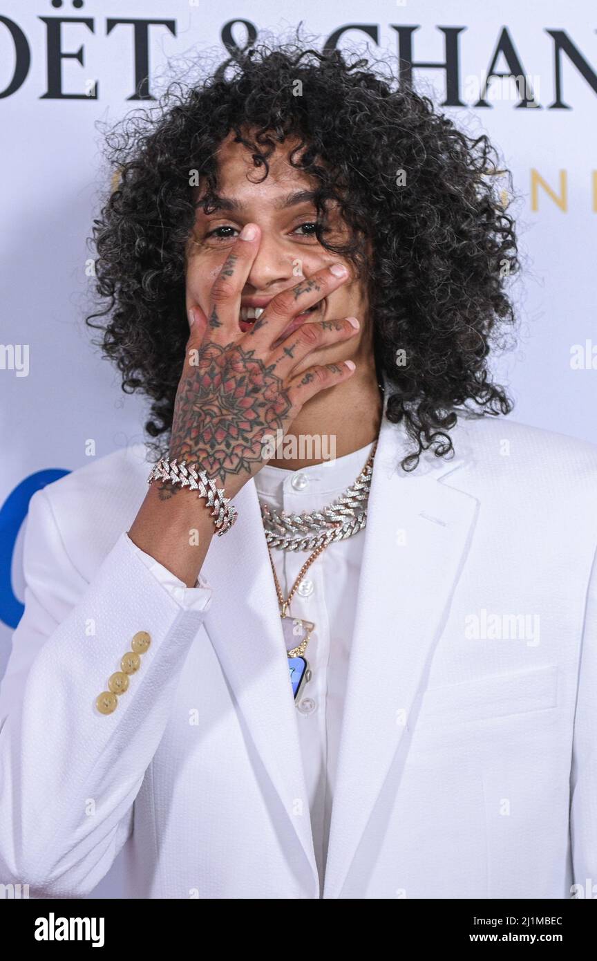 X Eyee walking on the red carpet at the Annual Oscars Weekend ...