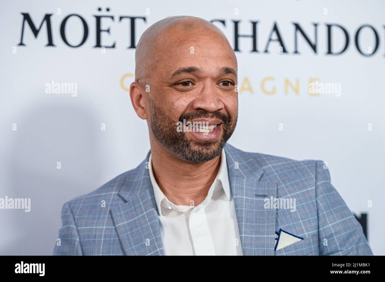 Omar McGee walking on the red carpet at the Annual Oscars Weekend ...