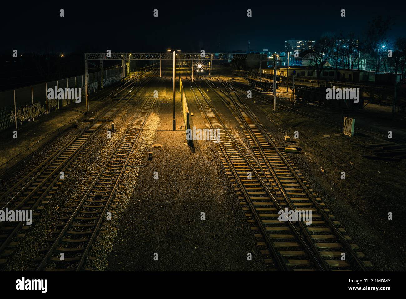 The empty railway at night Stock Photo - Alamy