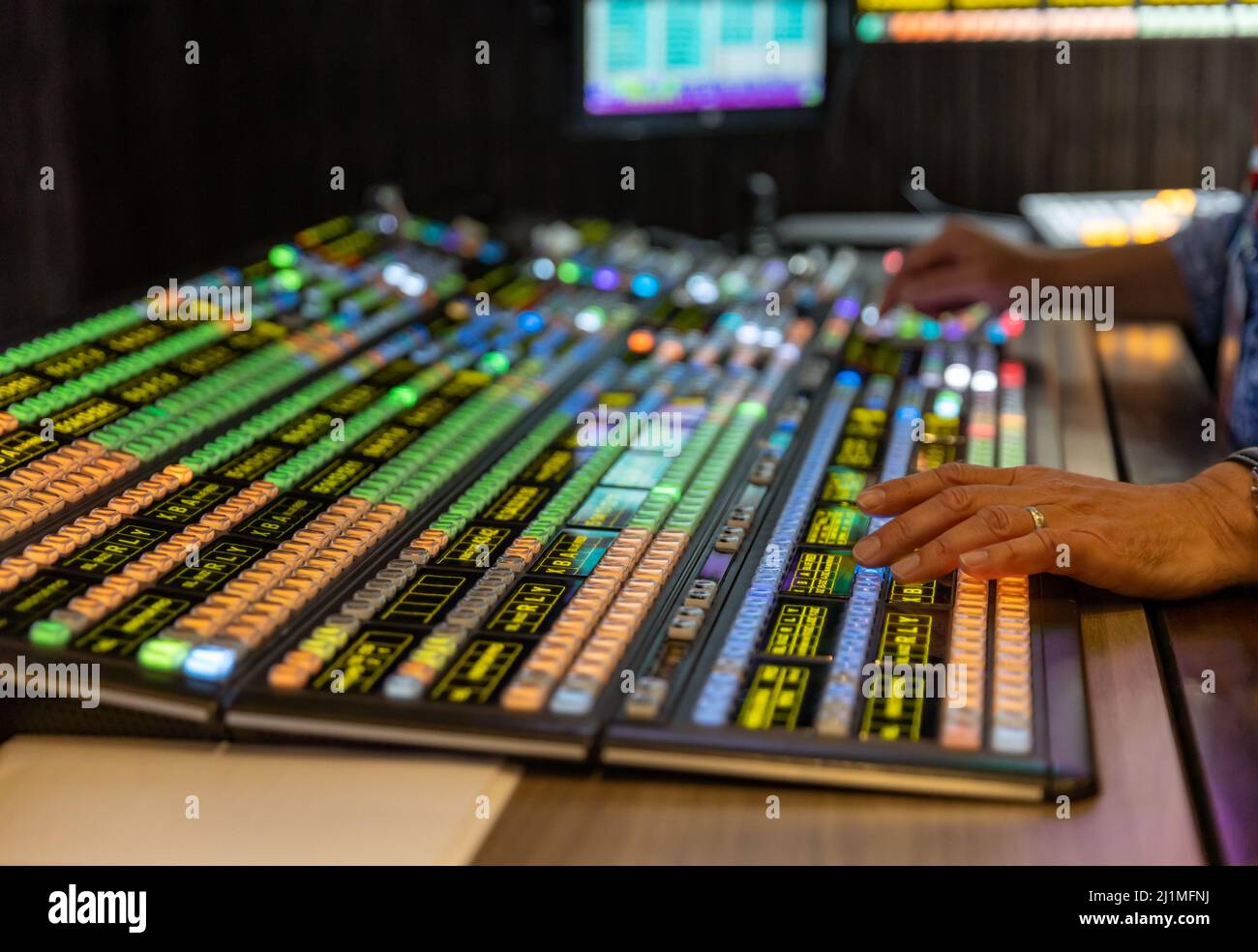 Technicians hands working on a video switcher for live television Stock ...