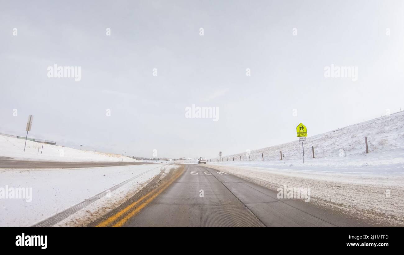 Driving on typical paved rural roads in suburban America Stock Photo ...