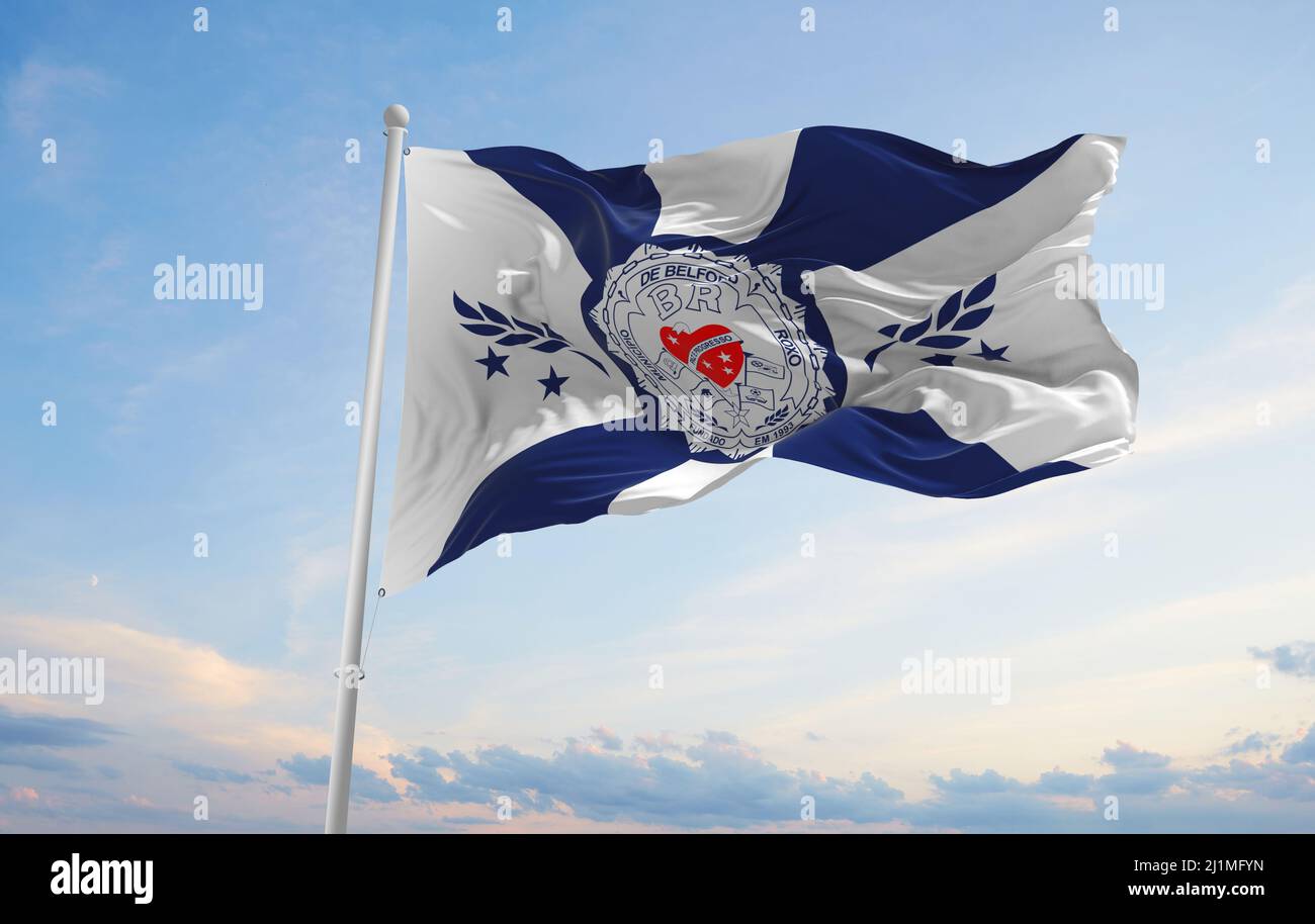 flag of Belford Roxo , Brazil at cloudy sky background on sunset ...